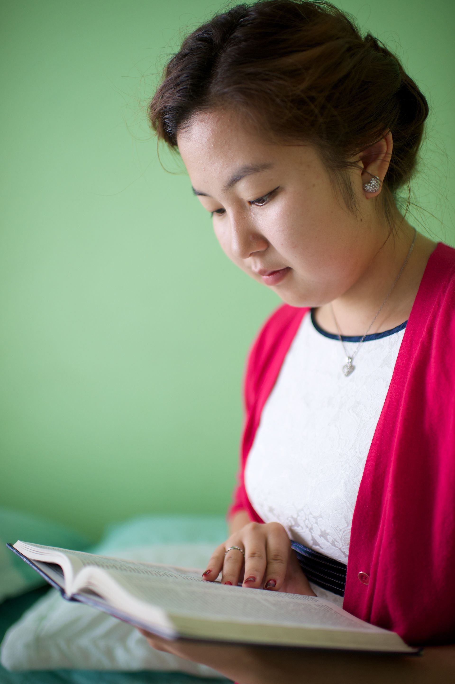 Young Woman Reading the Scriptures